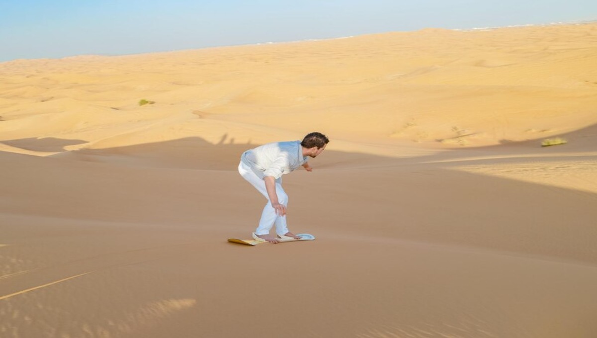 Enjoy the Best Sandboarding Experience in Dubai's Desert